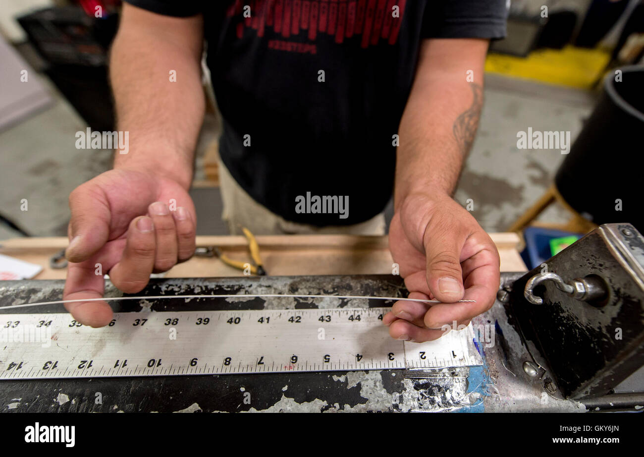 Los Angeles, California, USA. 23rd Aug, 2016. Master string maker ...