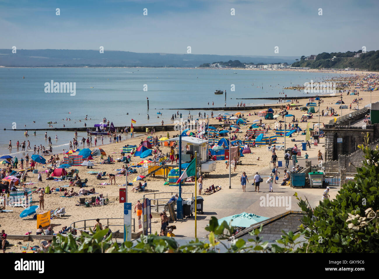 Bournemouth West Beach with holiday crowds enjoying the hot weather ...