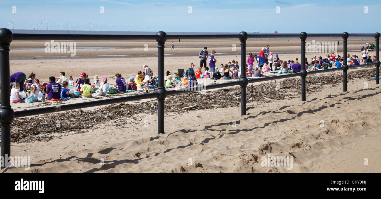 Sun seekers sunbathing on the beach hi-res stock photography and images ...