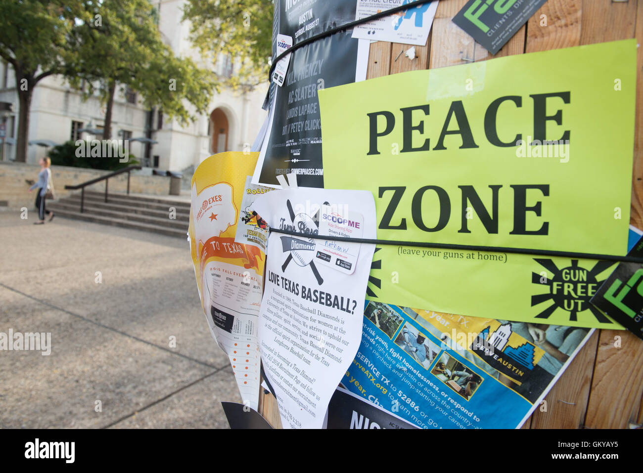 A peace zone flyer is stapled to a bulletin board on display at the ...