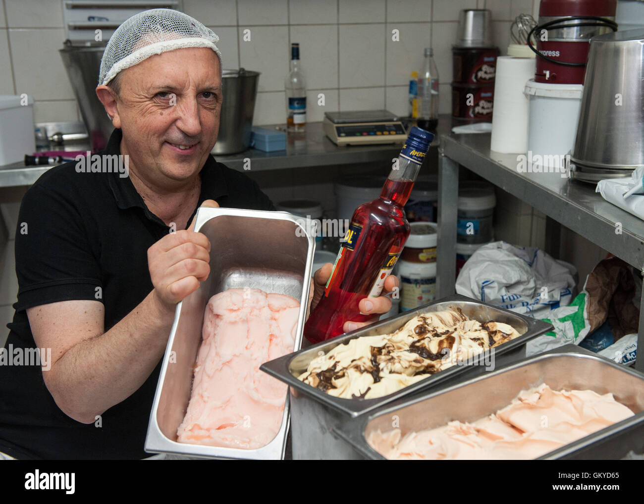 Bremen, Germany. 11th Aug, 2016. The ice-cream-maker Marco Lestam from ...