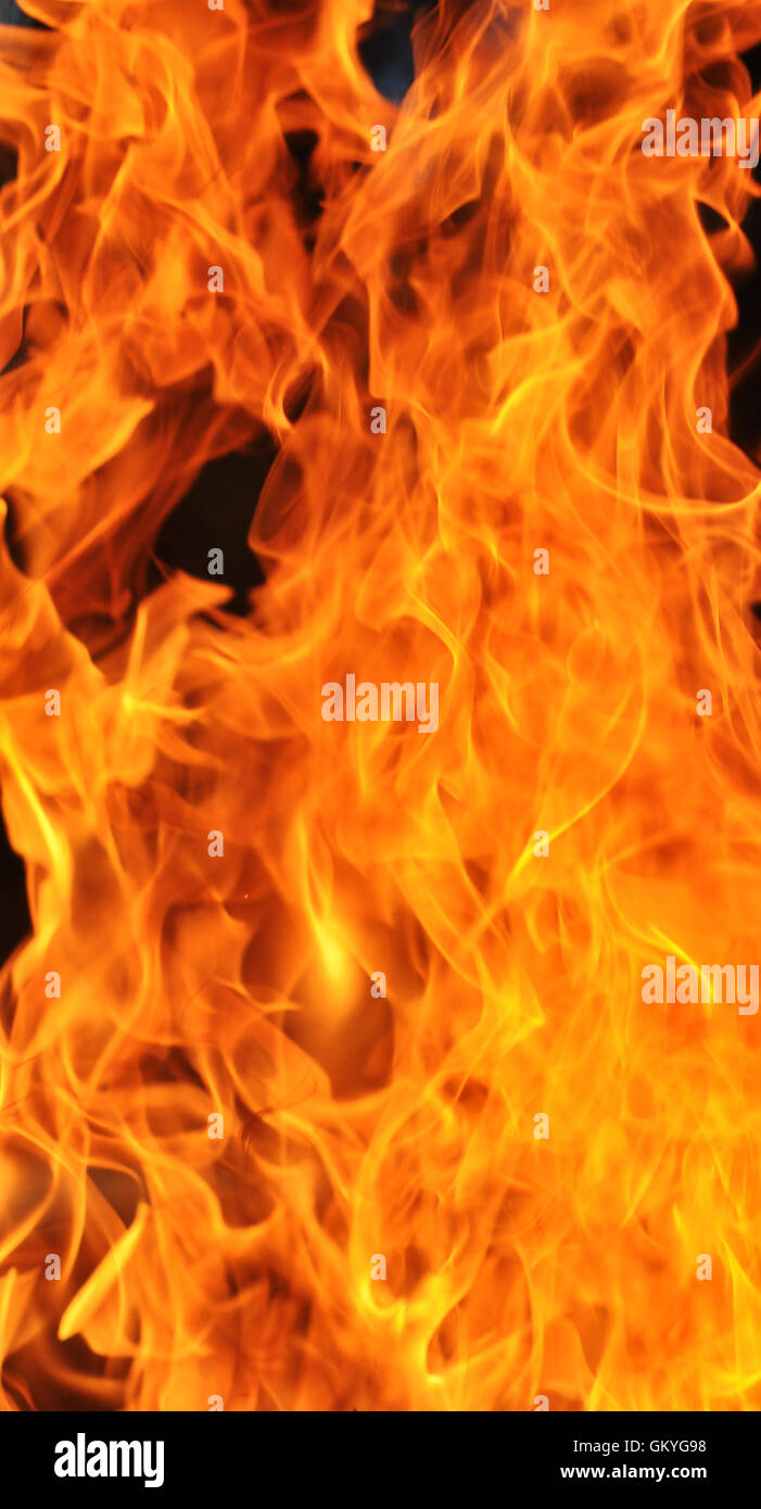 Bright orange spires make background. Fire pattern Stock Photo - Alamy