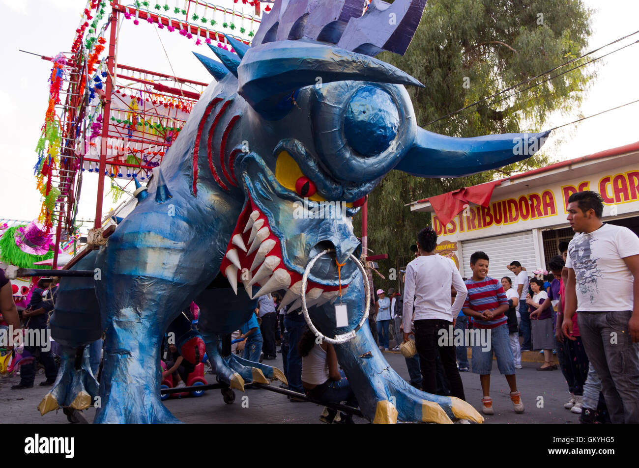 Giant cardboard bull (torito) with fireworks parading during the ...