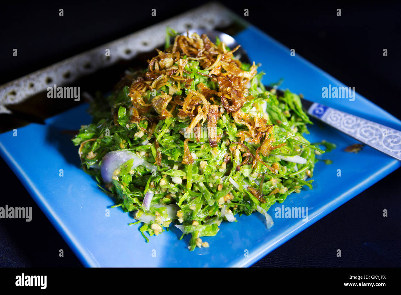 Traditional Burmese cuisine is served in Mandalay, Myanmar (Burma). A ...