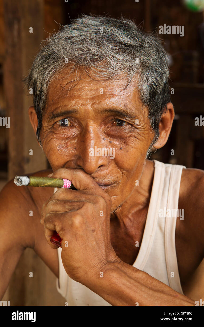 Smiling face of a burmese man hi-res stock photography and images - Alamy