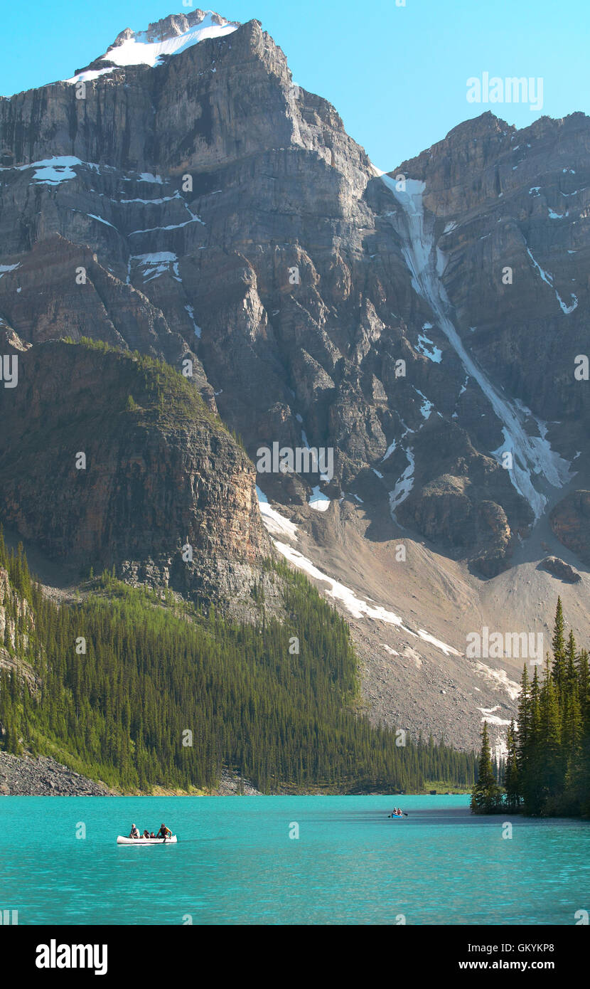Canoeing at Moraine lake. Alberta. Canada. Vertical Stock Photo - Alamy