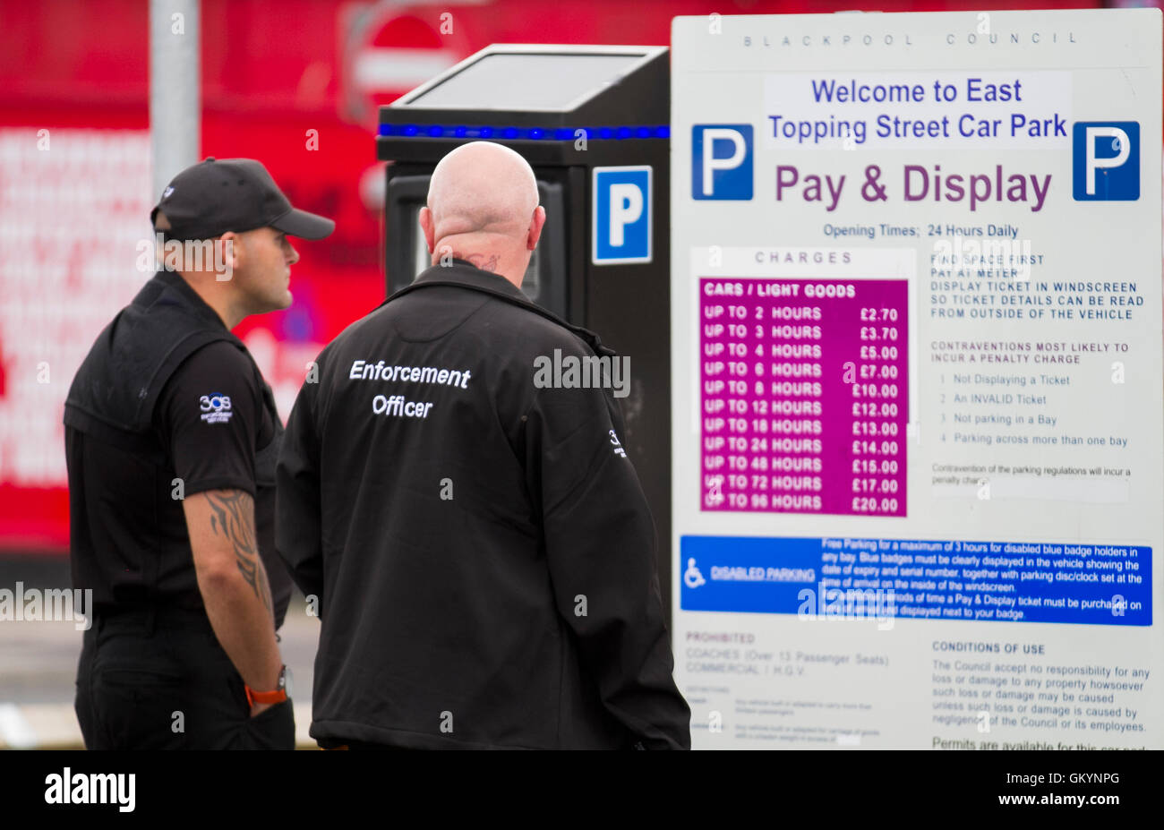 Black uniformed Civil Enforcement officers in Topping Street, Blackpool ...