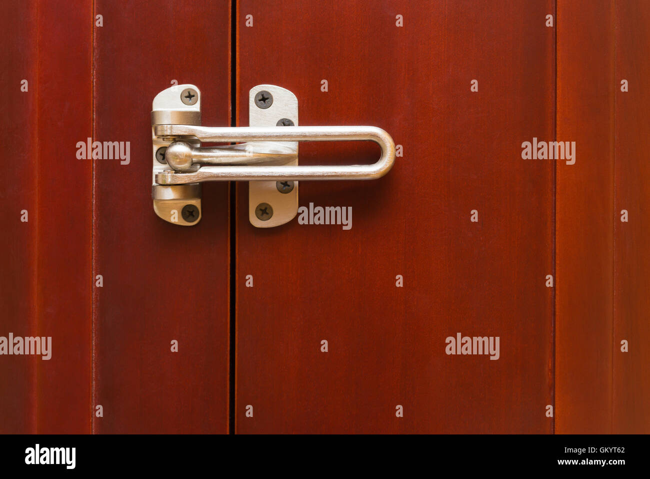 locked stainless steel safety latch at home Stock Photo - Alamy
