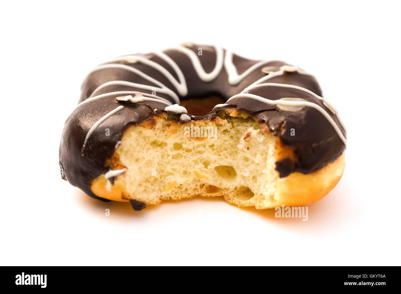 side view chocolate flavor donut with a bite on white background Stock ...