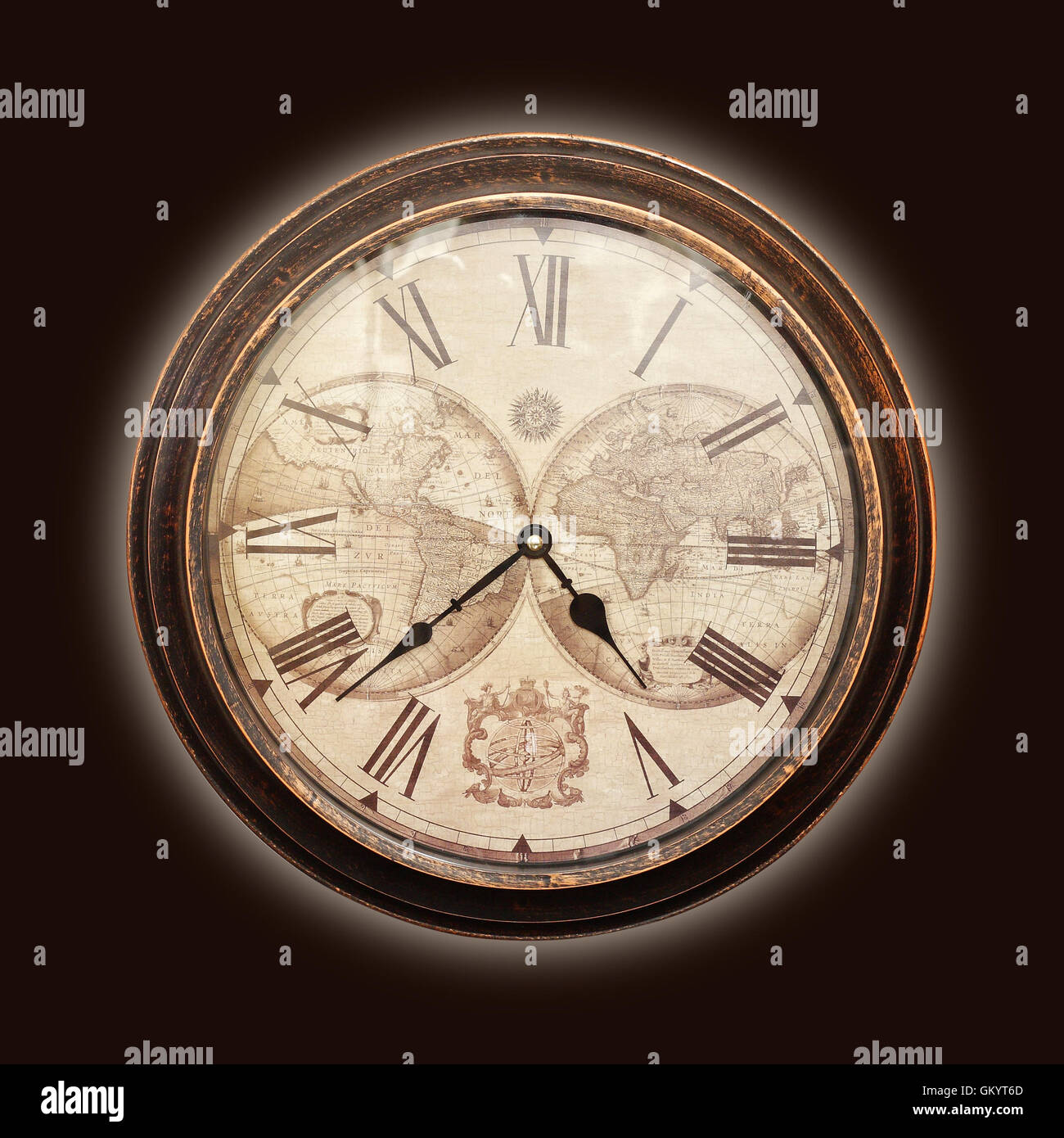 Clock - Vintage mechanical wall clock on brown background Stock Photo ...
