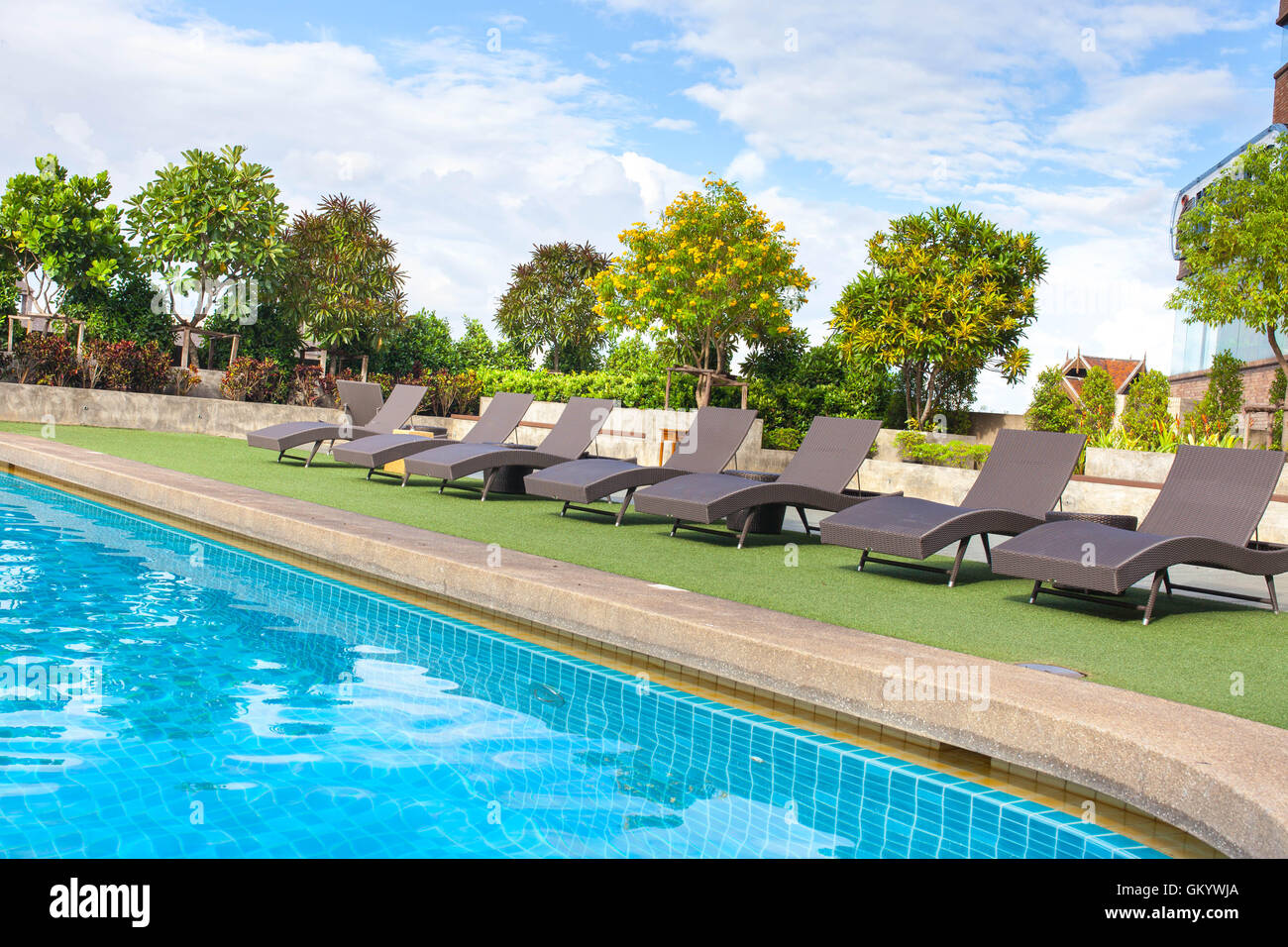 chair side swimming pool relax place. View from eye Stock Photo - Alamy