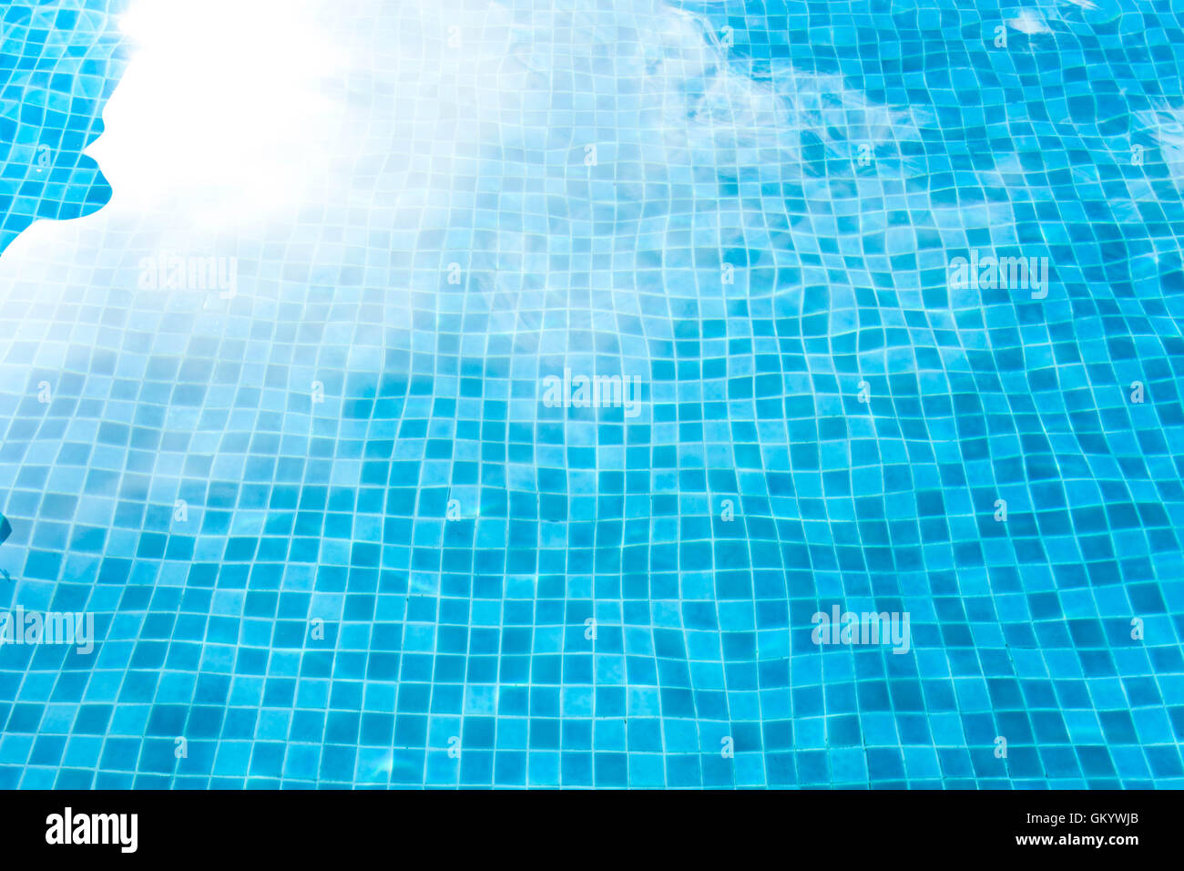 Blue tiled swimming pool background. View from eye Stock Photo - Alamy