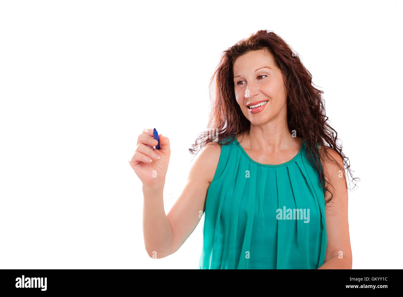 Handsome mature lady woman with pen writing in the air as on imaginary ...
