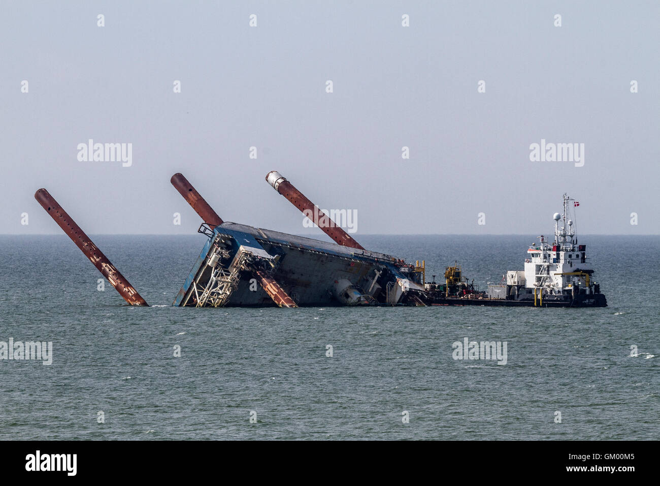 The capsized offhore wind rig SEA WORKER off Nymindegab at the Danish ...