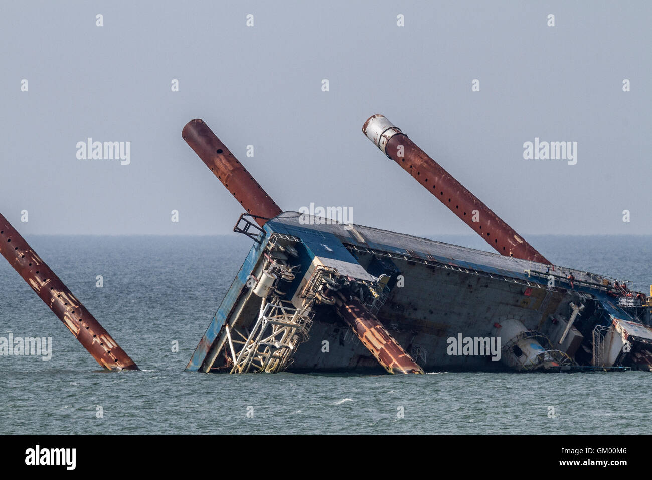 The capsized offhore wind rig SEA WORKER off Nymindegab at the Danish ...