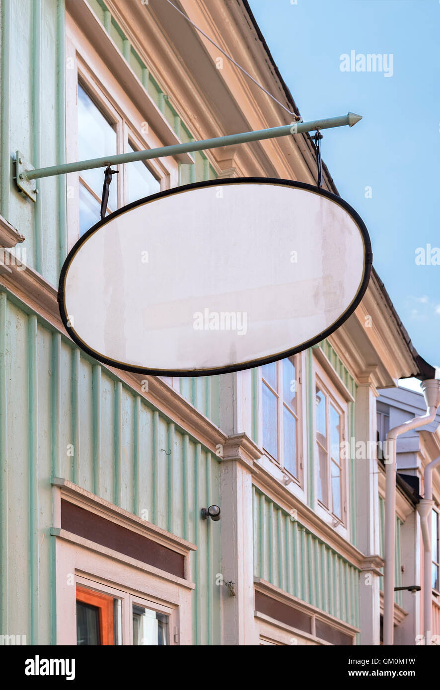 Image of vintage shop sign hanging on wooden building Stock Photo - Alamy