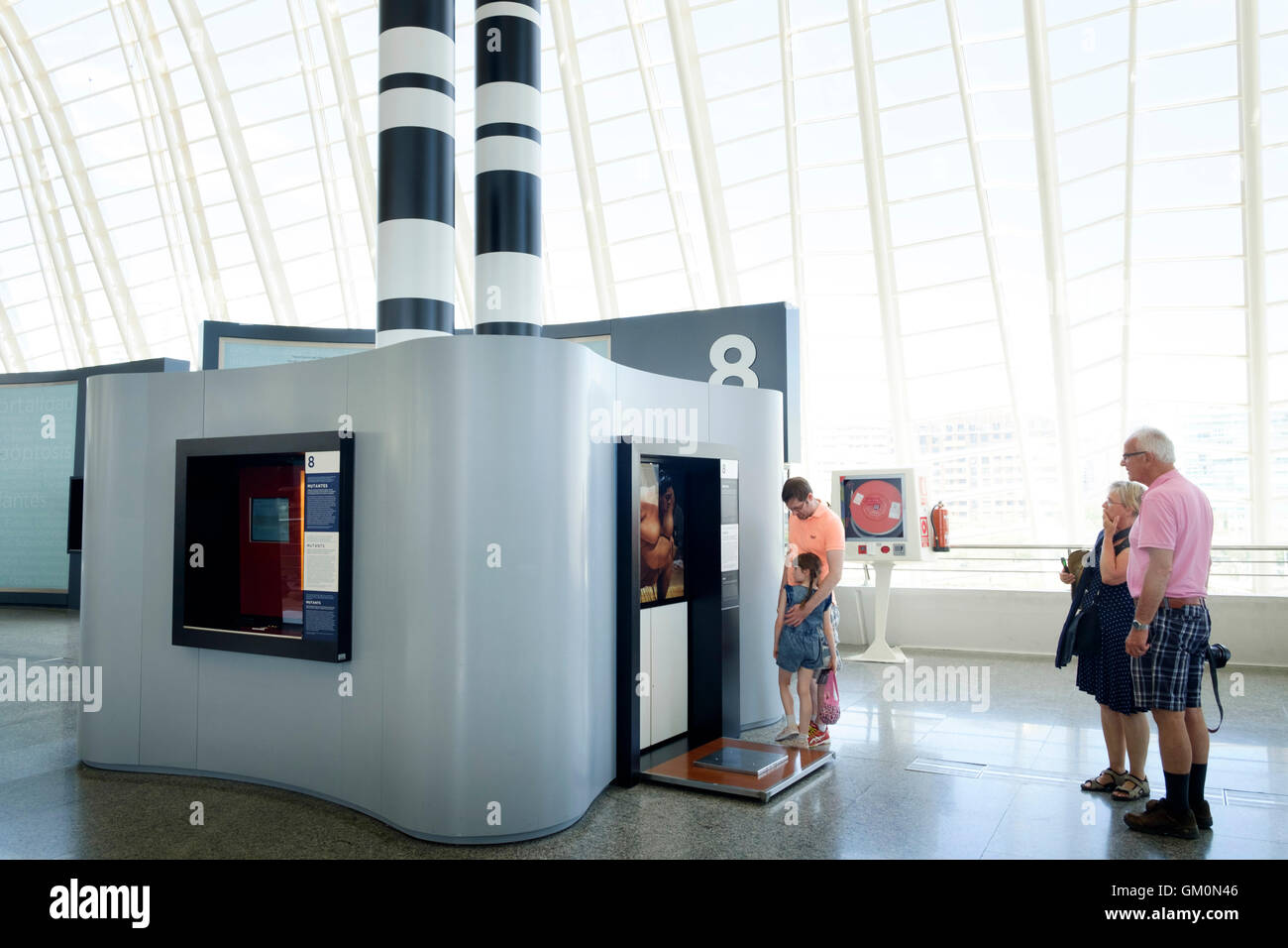 Visitors look at interactive displays inside the Principe Felipe ...