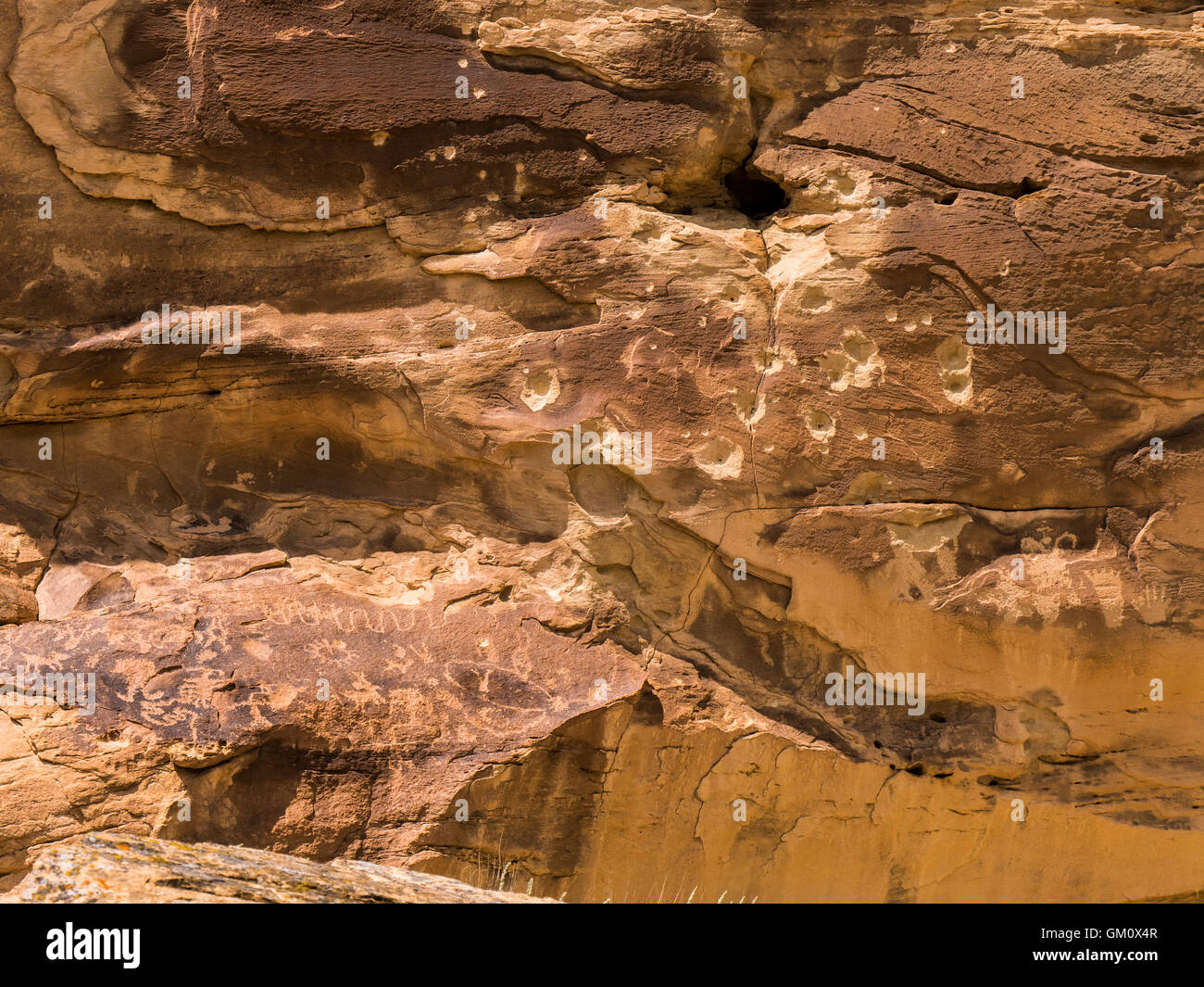 Bullet holes in the rock at the East Four Mile Site, Canyon Pintado ...