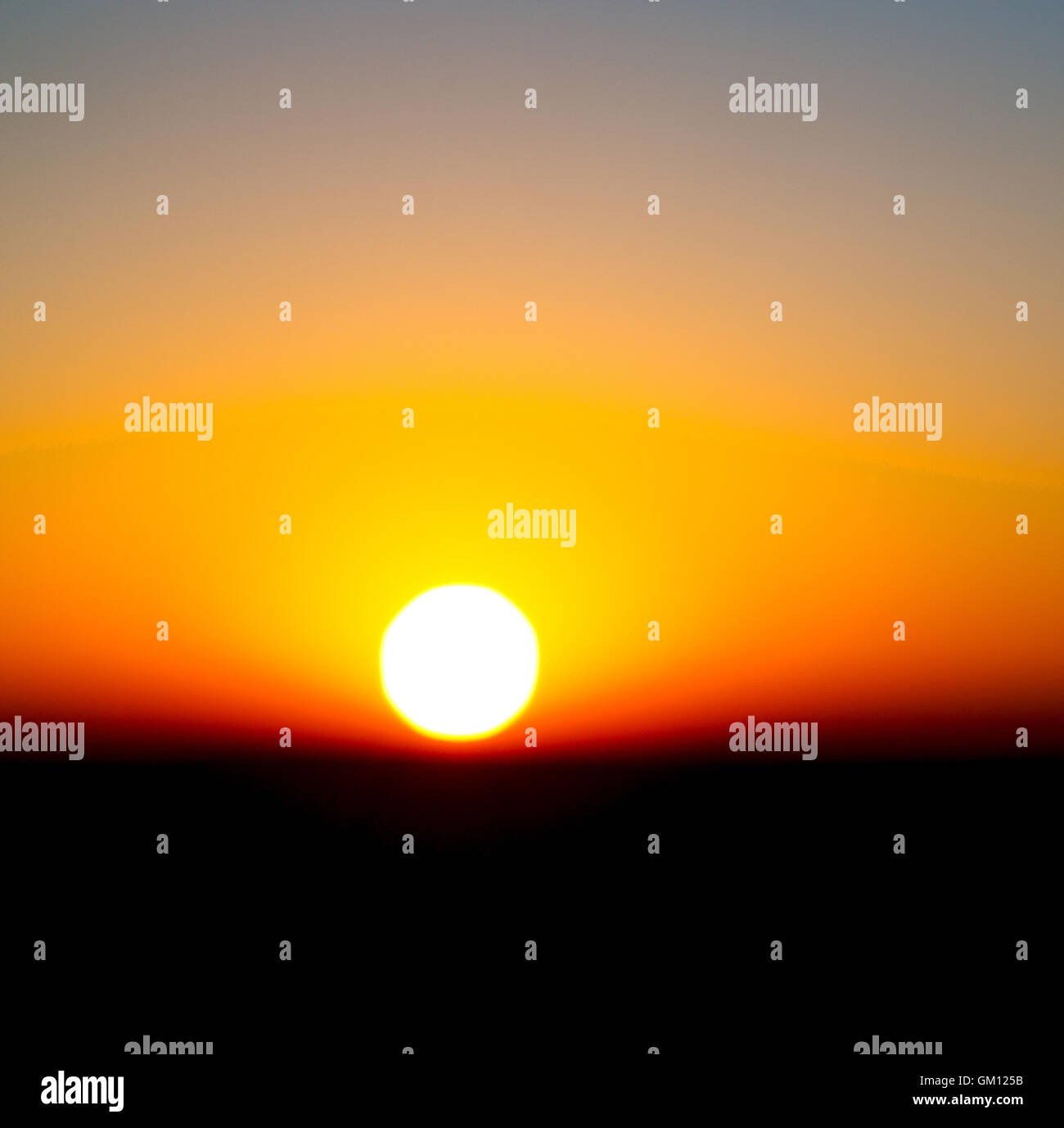 the blurred sun falling down arabian mountain in oman Stock Photo - Alamy