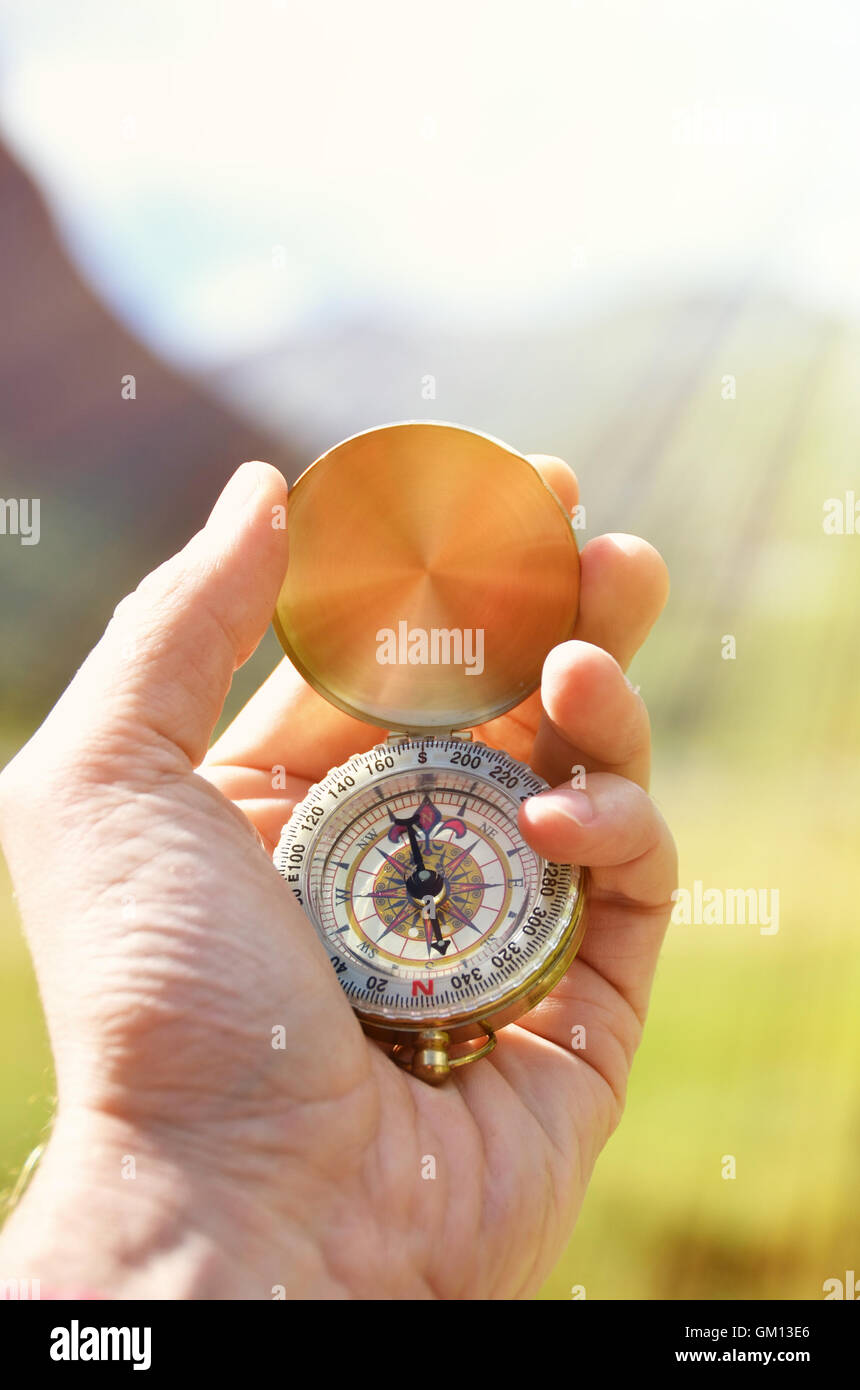 Compass in the hand Stock Photo - Alamy