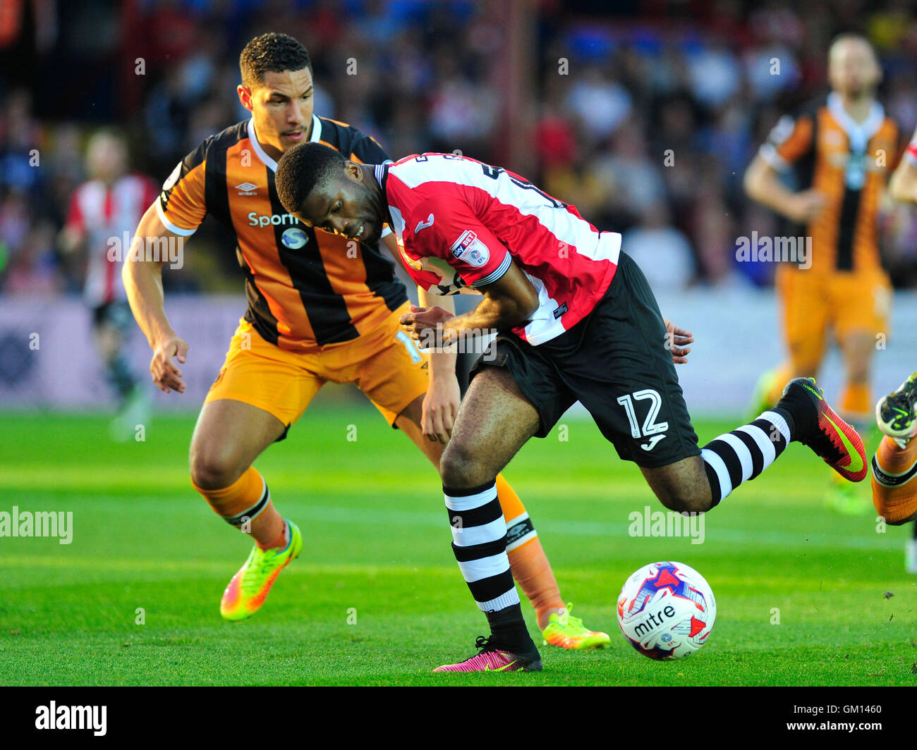Exeter City's Jeol Grant and Hull City's Jake Livermore (left) in ...
