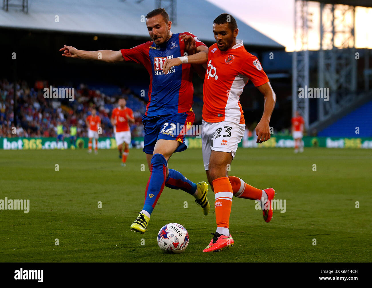 Crystal Palace's Jordon Mutch (left) and Blackpool's Colin Daniel ...
