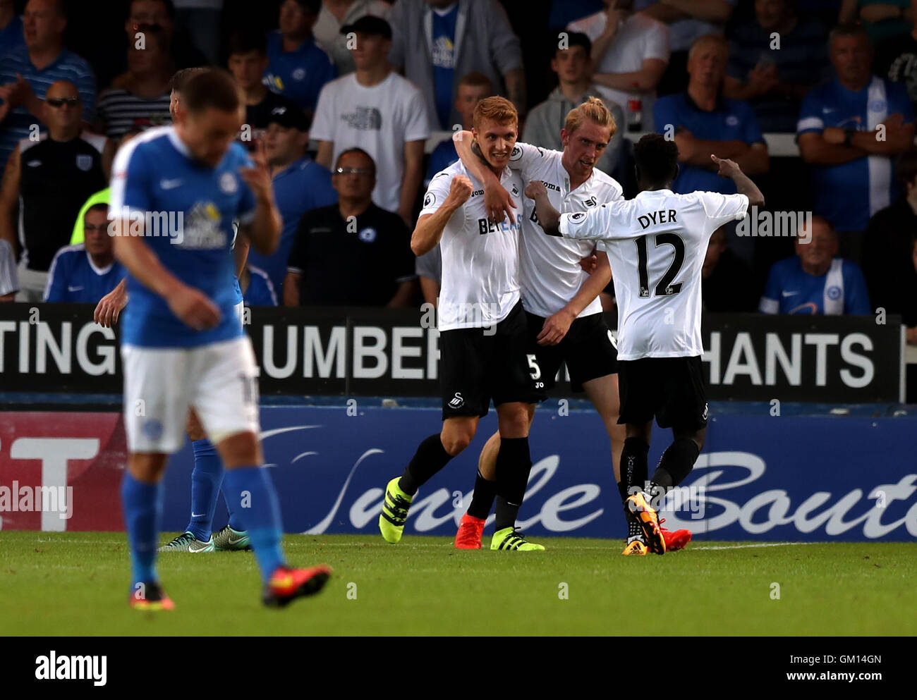 Swansea City's Jay Fulton (centre left) celebrates scoring his side's ...