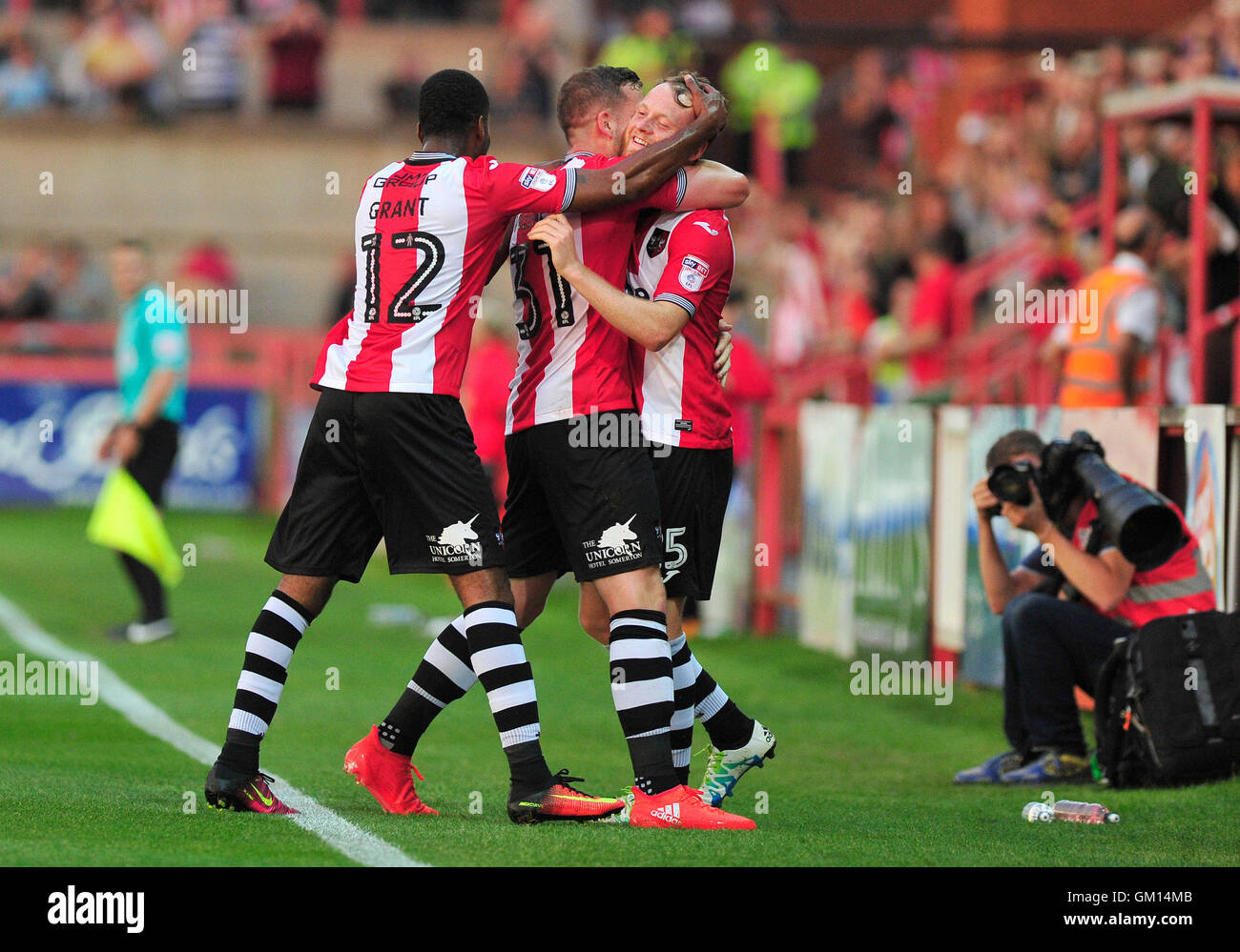 Exeter City's Jake Taylor (right) celebrates his goal to make it 1-0 ...