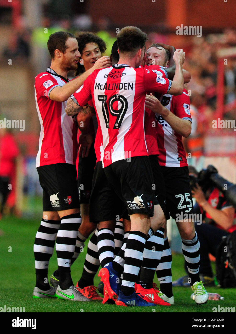 Exeter City's Jake Taylor (right) celebrates his goal to make it 1-0 ...
