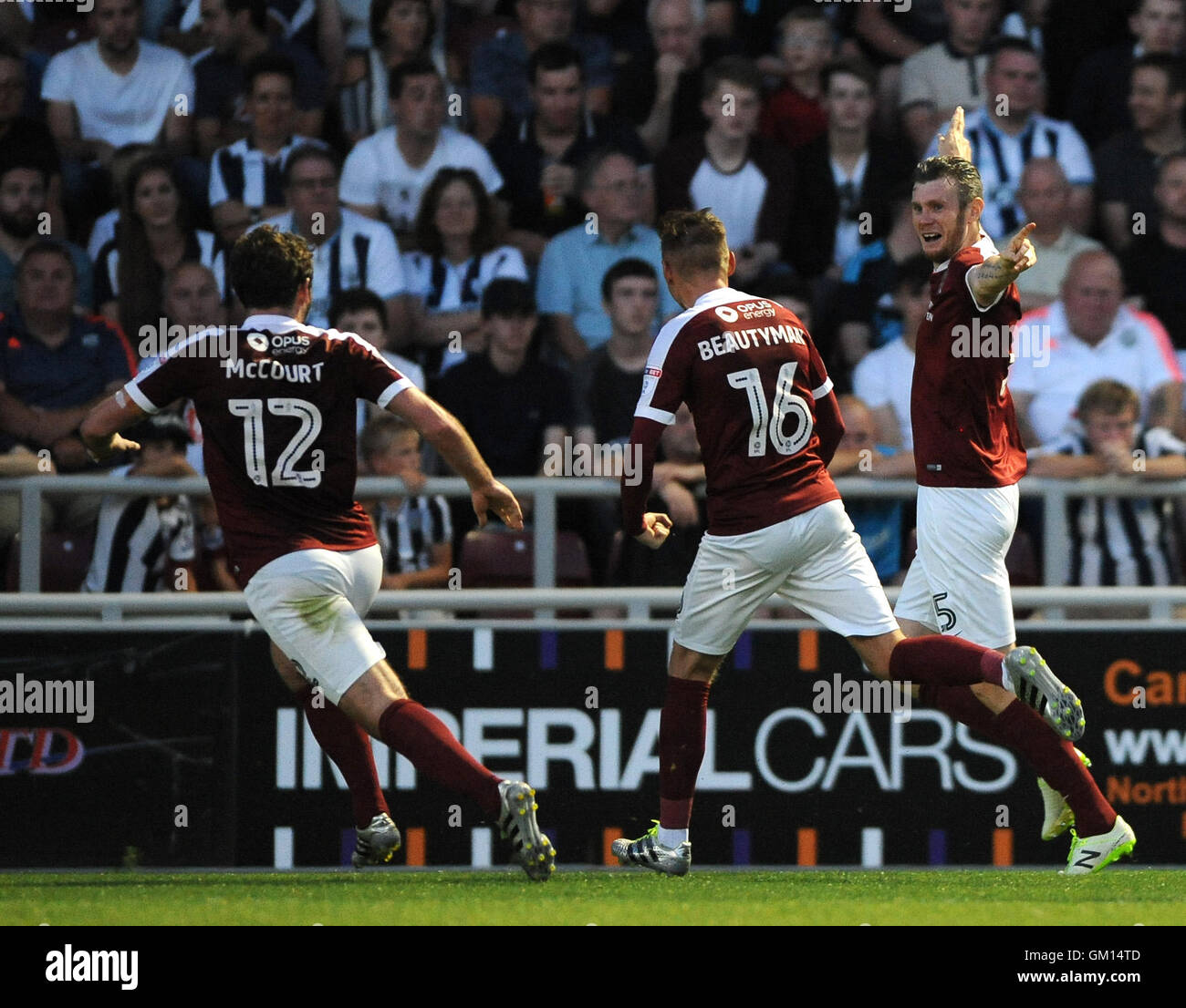Northampton's Zander Diamond (right) celebrates with team mates after ...