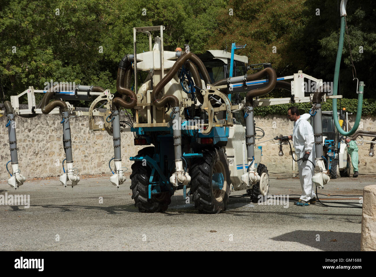 Man washing tractor hi-res stock photography and images - Alamy