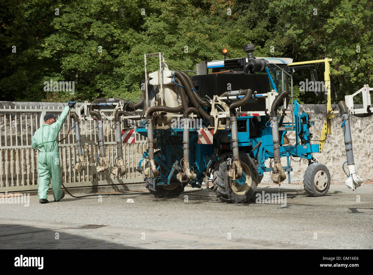 Man washing tractor hi-res stock photography and images - Alamy