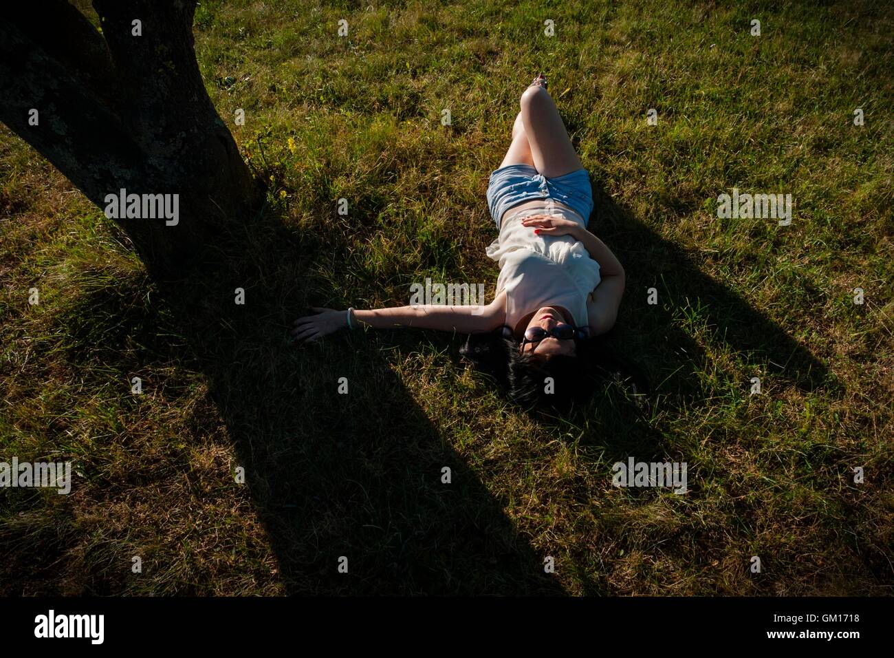 Laying lying down position posture hi-res stock photography and images ...