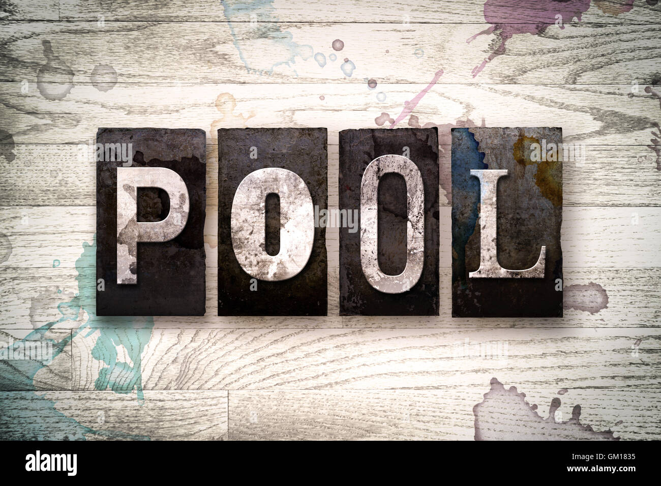 The word "POOL" written in vintage dirty metal letterpress type on a ...