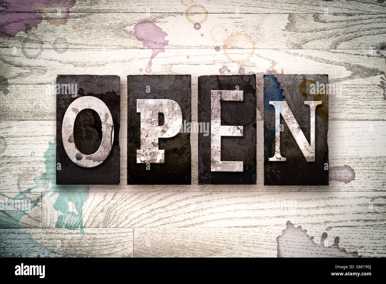 The word "OPEN" written in vintage dirty metal letterpress type on a ...