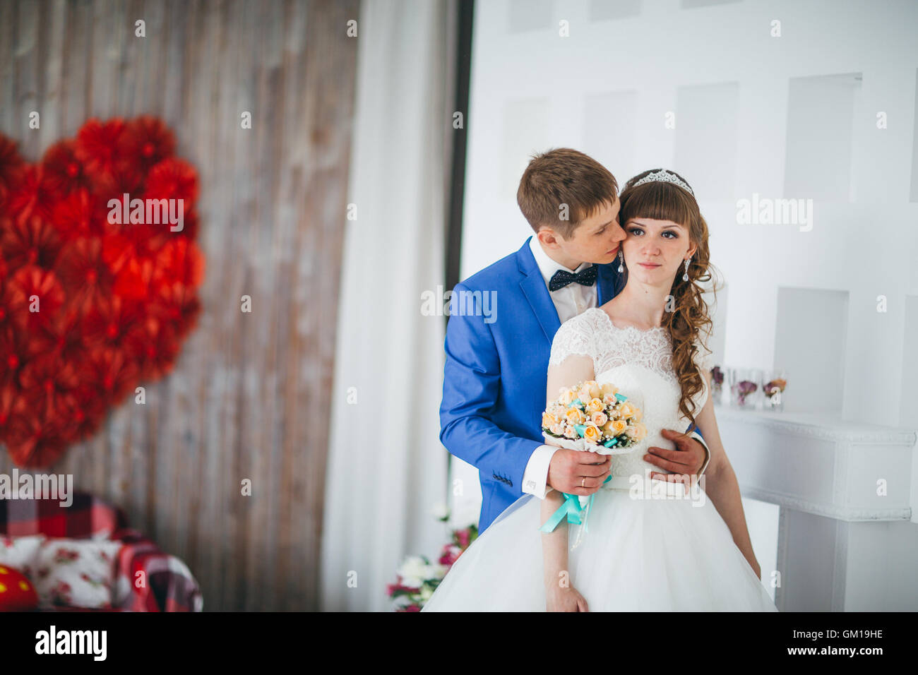 young bride and groom in interior design studio Stock Photo - Alamy