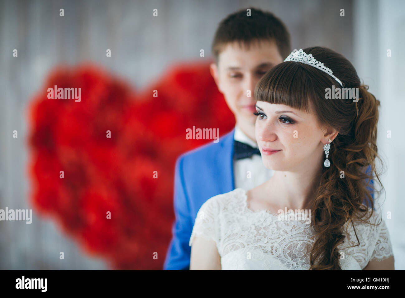 young bride and groom in interior design studio Stock Photo - Alamy