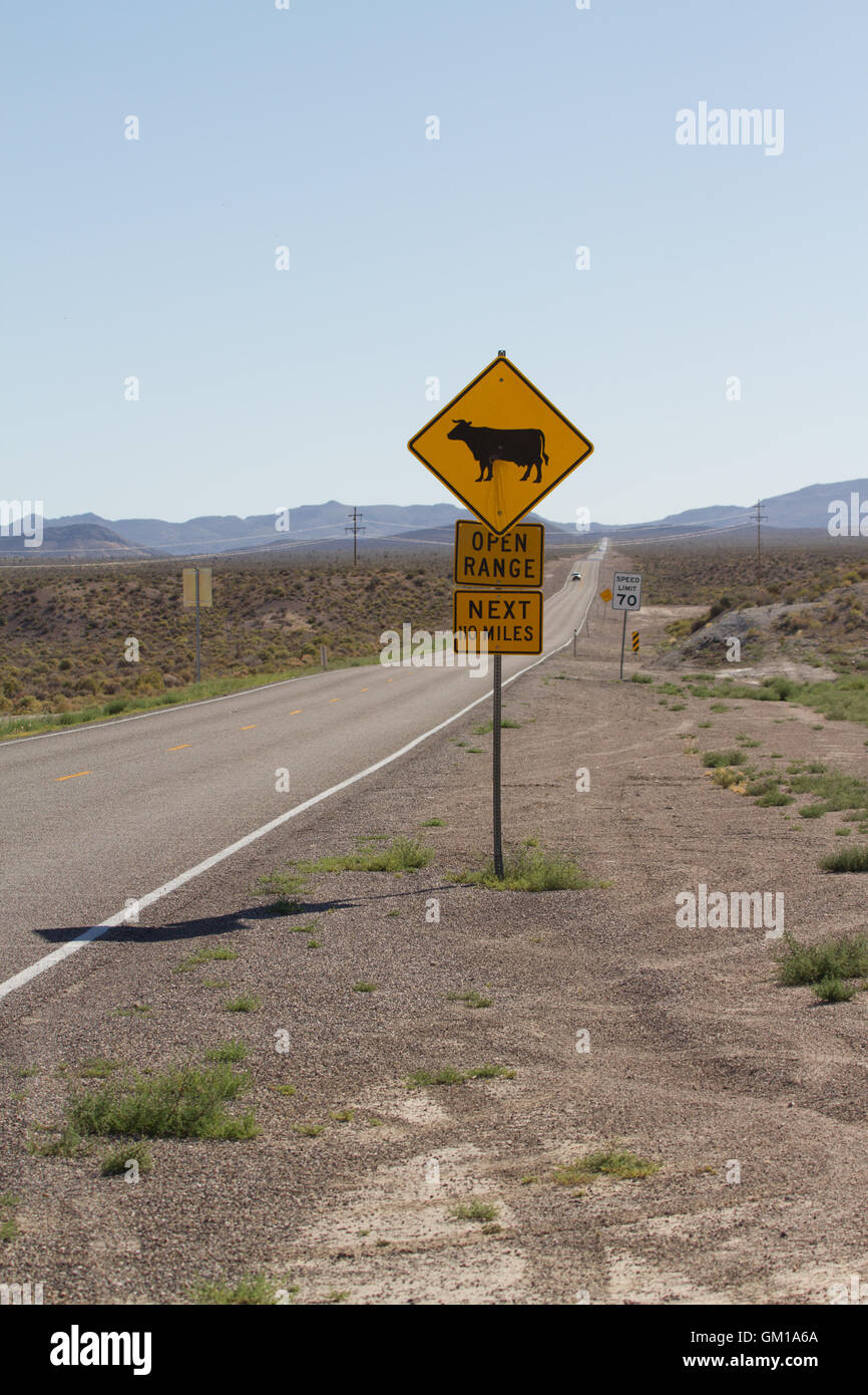 Open range cattle warning sign USA Stock Photo - Alamy