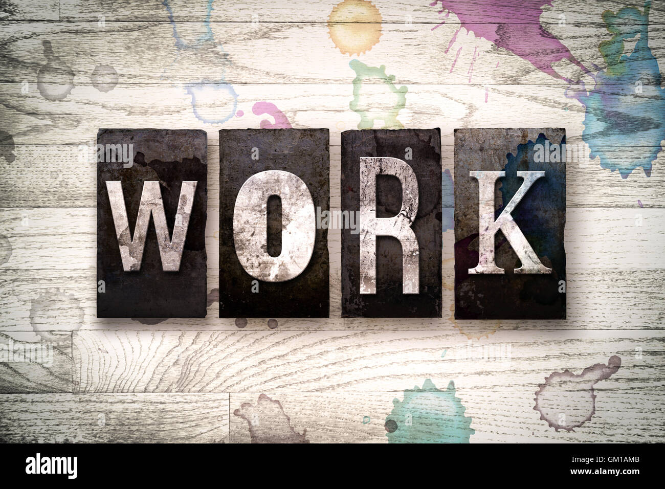 The word "WORK" written in vintage dirty metal letterpress type on a ...