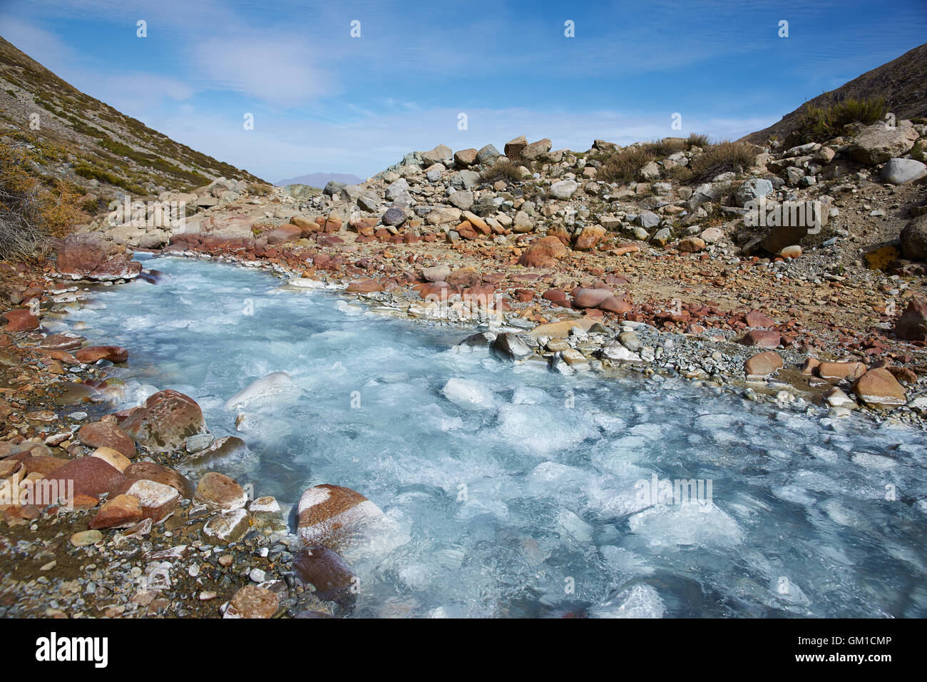 Ice cold river from the Paloma glacier running through autumn coloured ...