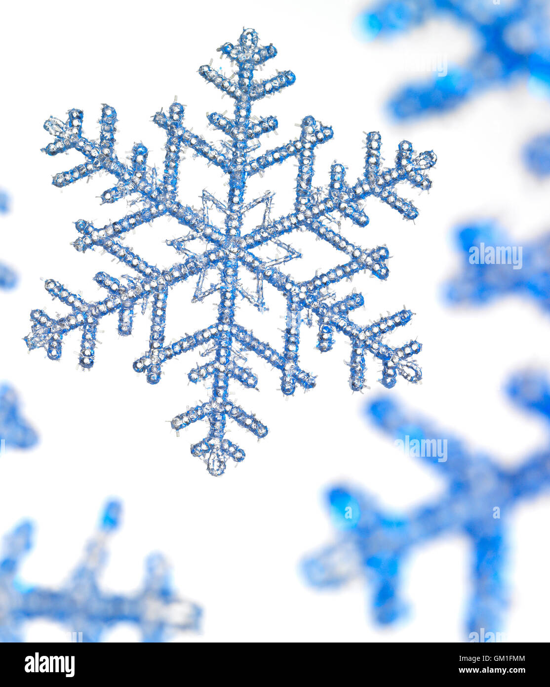 Snowflake with a white background Stock Photo - Alamy