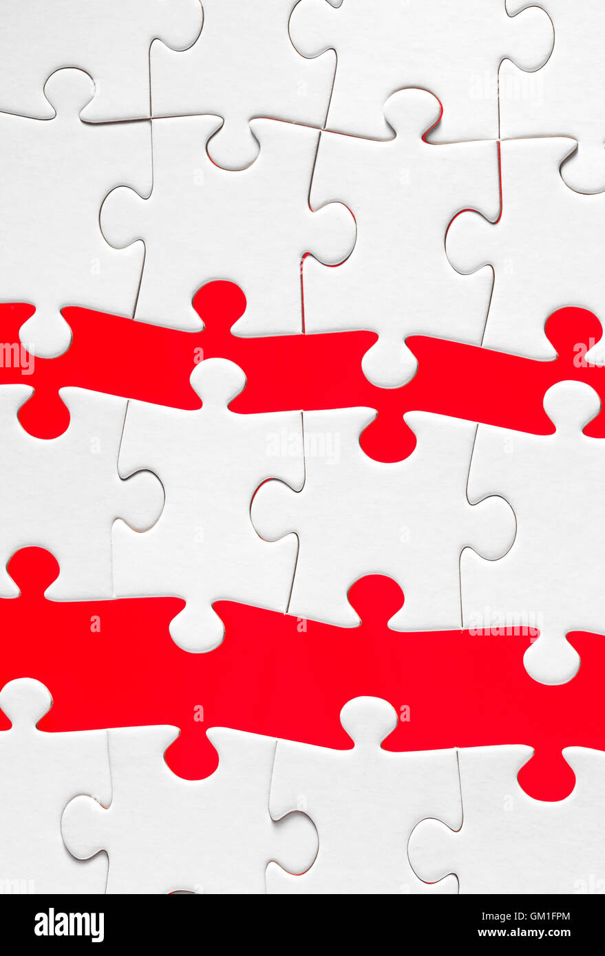 Pieces of a jigsaw hi-res stock photography and images - Alamy