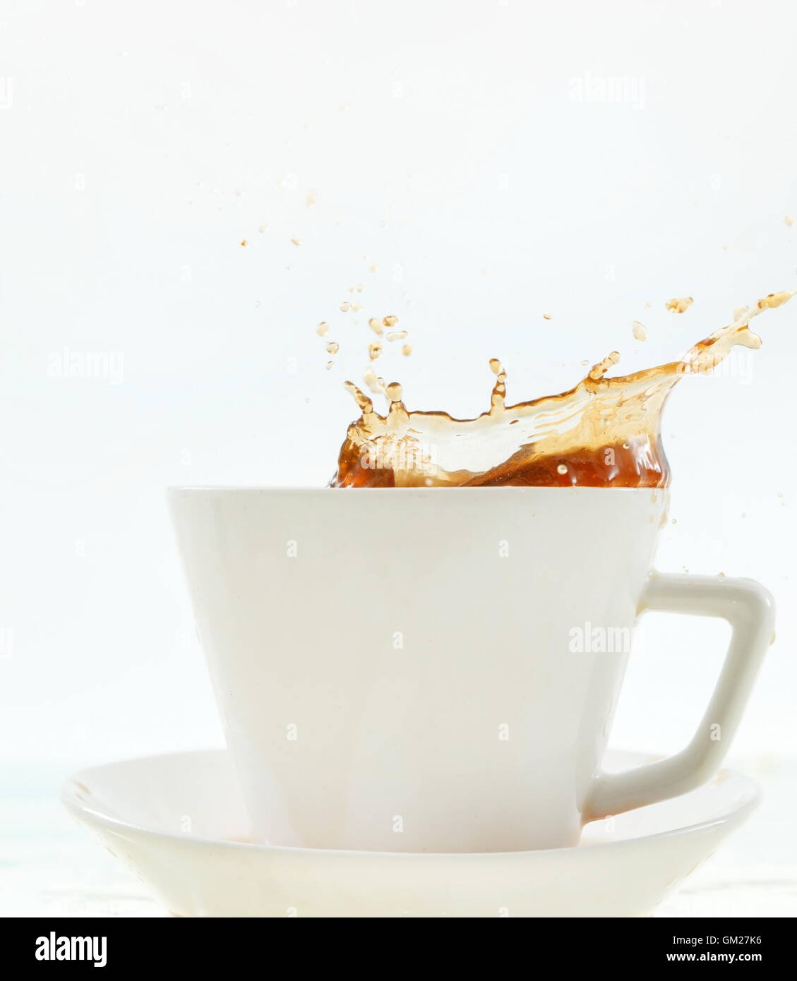 Coffee crown splash in mug Stock Photo - Alamy