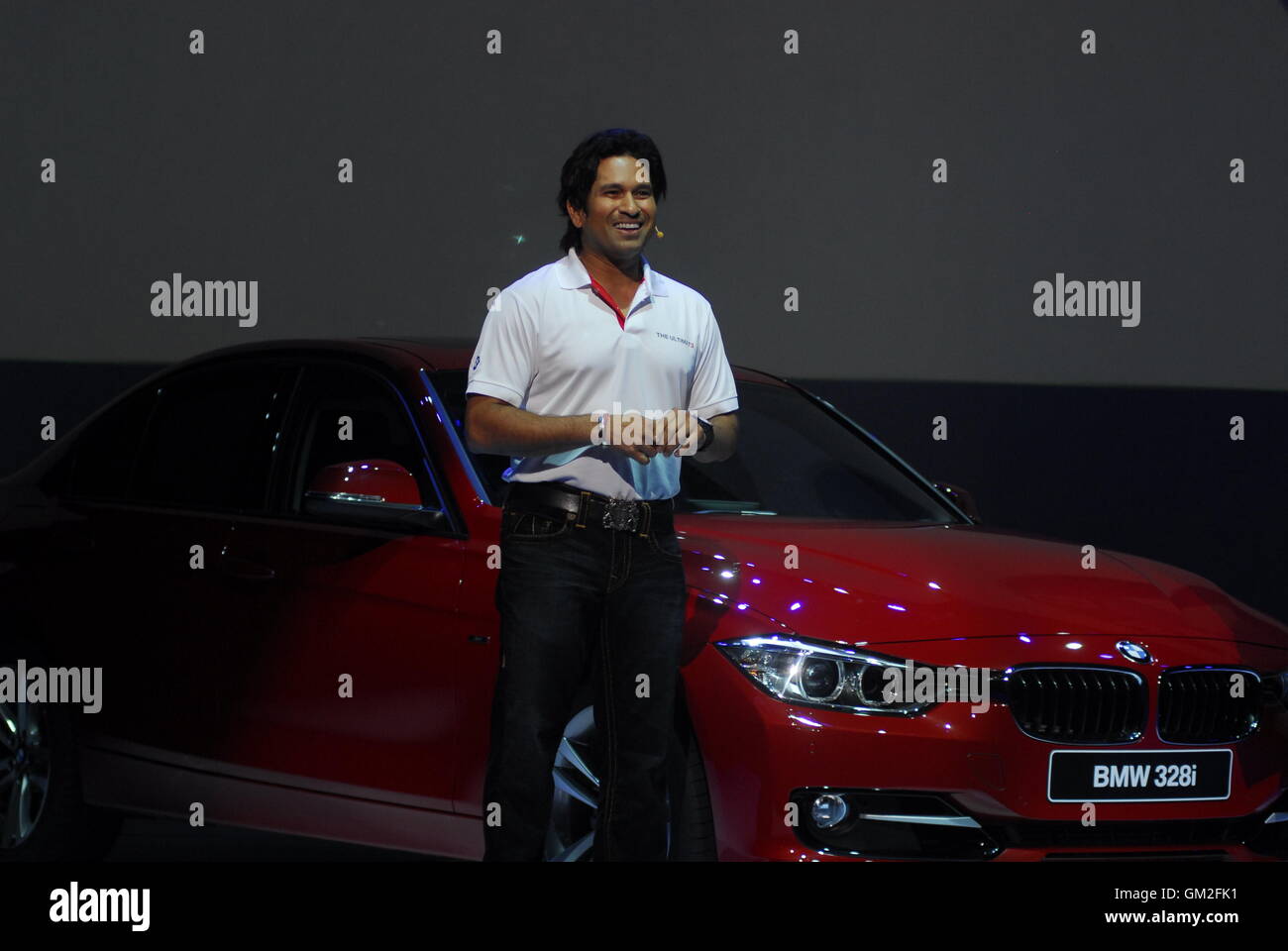 Indian cricketer Sachin Tendulkar poses with the new BMW 328i Sportline ...