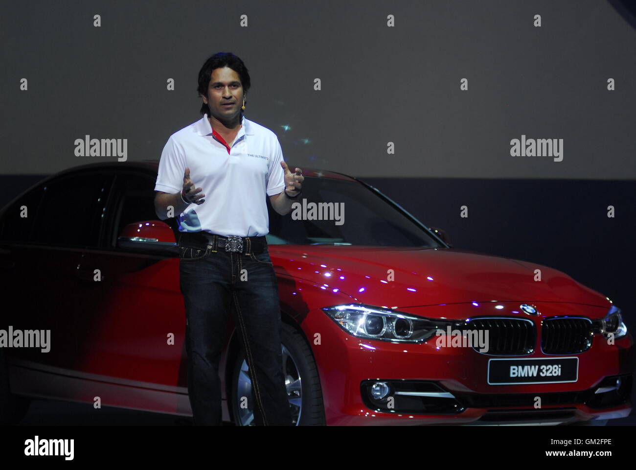 Indian cricketer Sachin Tendulkar poses with the new BMW 328i Sportline ...