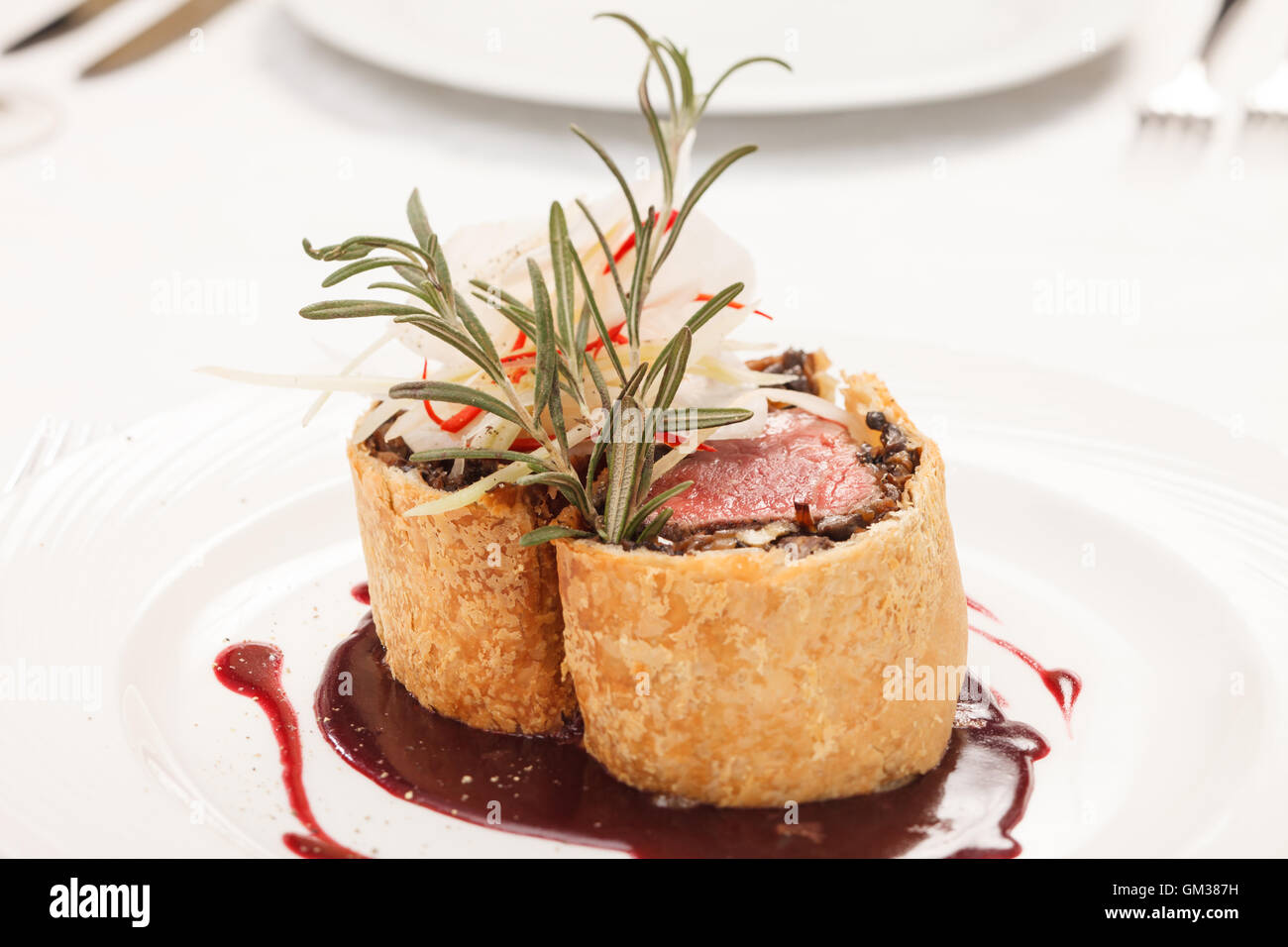 Fillet Wellington with fresh herbs Stock Photo - Alamy