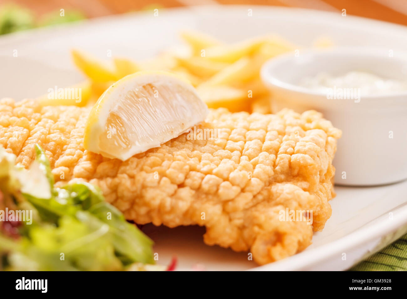 fish with french fries potatoes Stock Photo - Alamy
