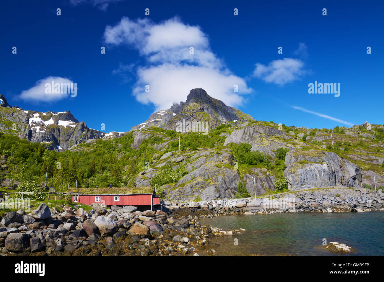 Norwegian hut in fjord Stock Photo - Alamy