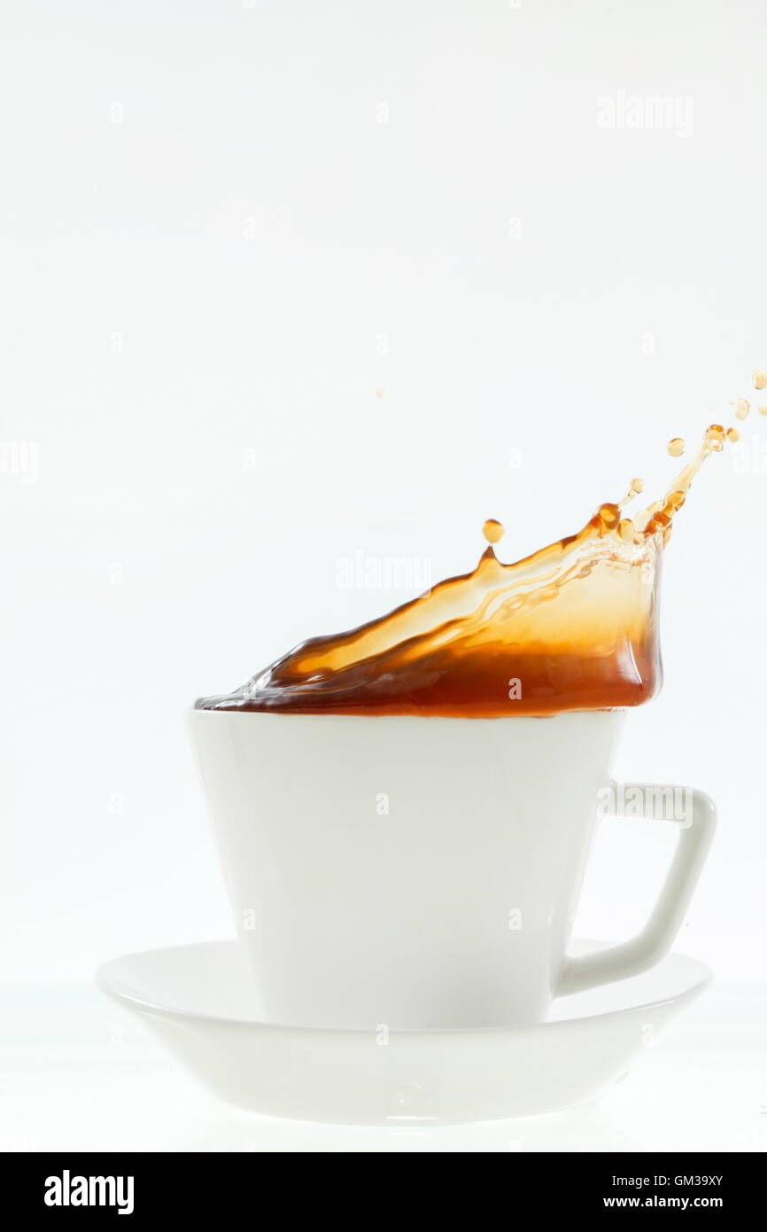 Coffee crown splash in mug Stock Photo - Alamy