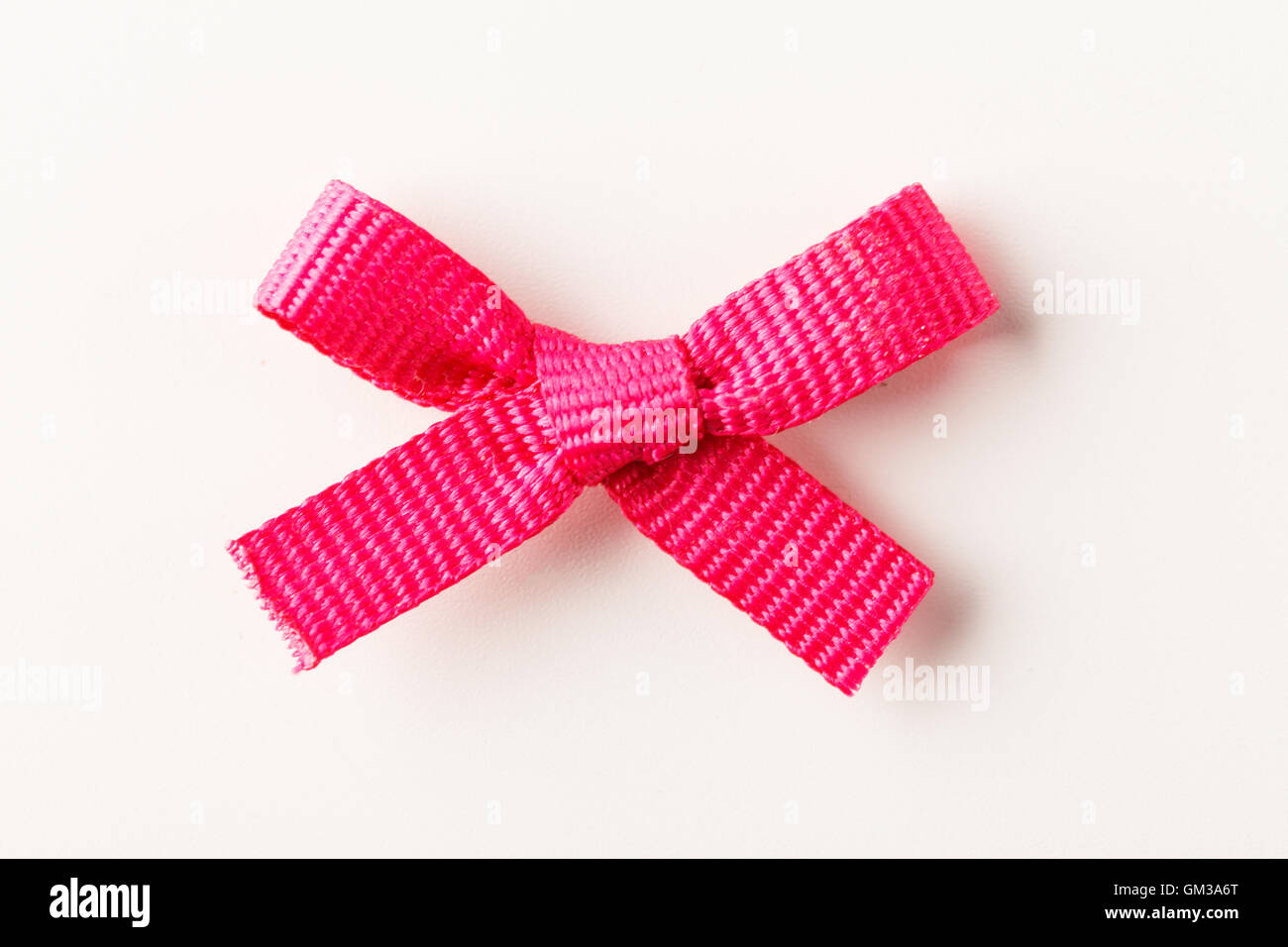 pink gift bow Stock Photo - Alamy